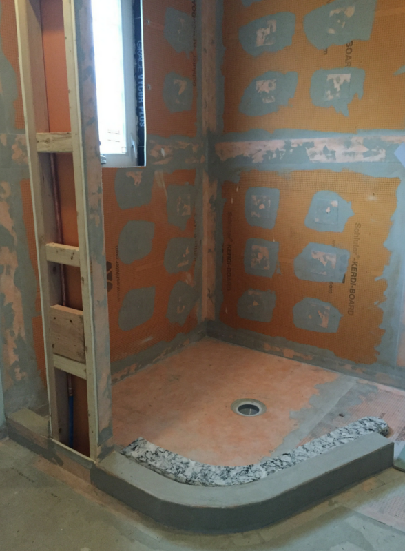 Small shower remodeling with an open curved glass block shower wall ...