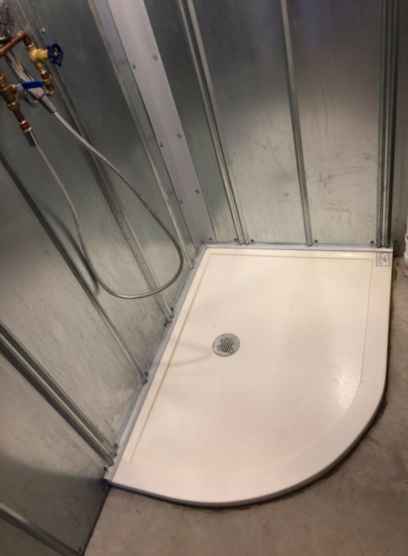 How to choose between a solid surface or ready for tile shower pan for ...